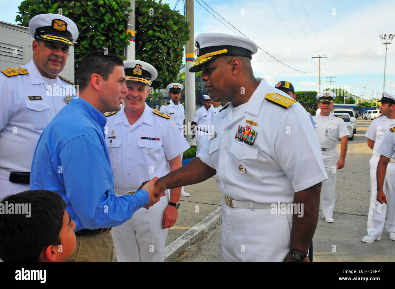 U.S. Navy Rear Adm. Sinclair M. Harris, center, the commander of U.S ...