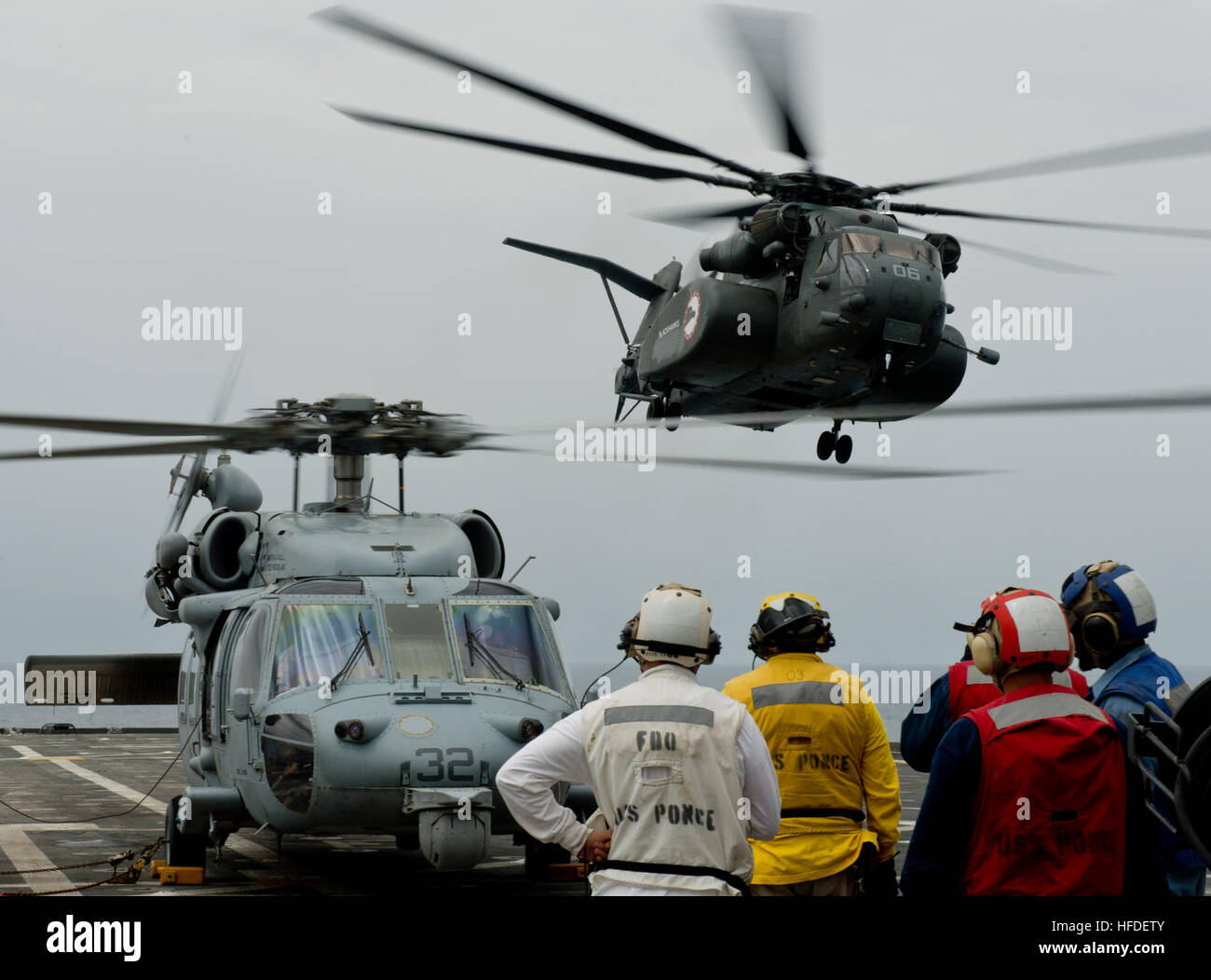 Personnel assigned to Helicopter Mine Countermeasures Squadron (HM) 15 ...