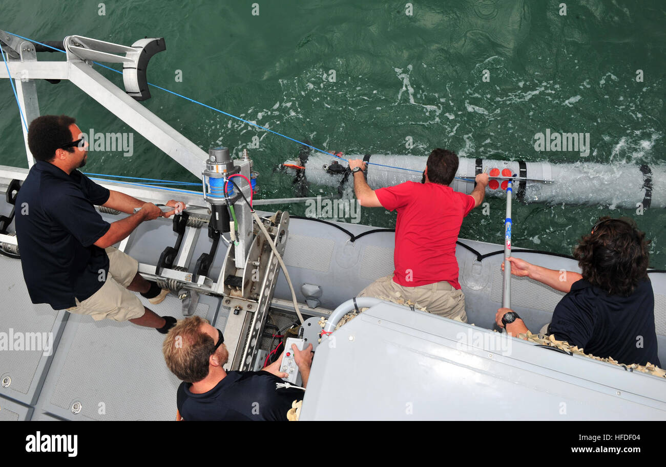 Personnel assigned to the UUV detachment retrieve an unmanned ...
