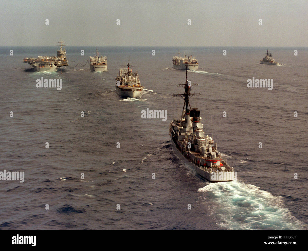 An overall stern view of Carrier Group Eight underway. The ships are ...