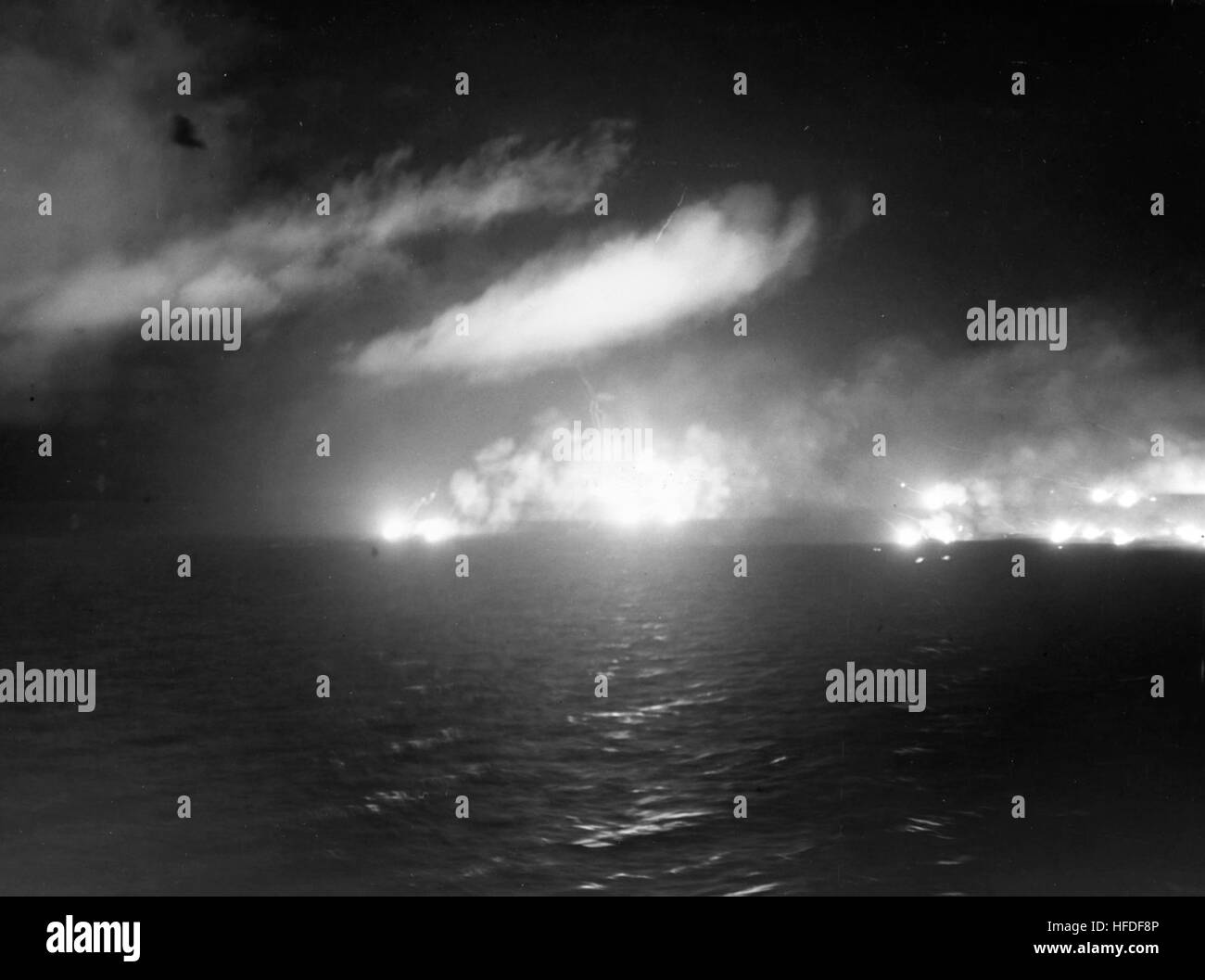 US cruisers firing during Battle of Surigao Strait on 25 October 1944 ...