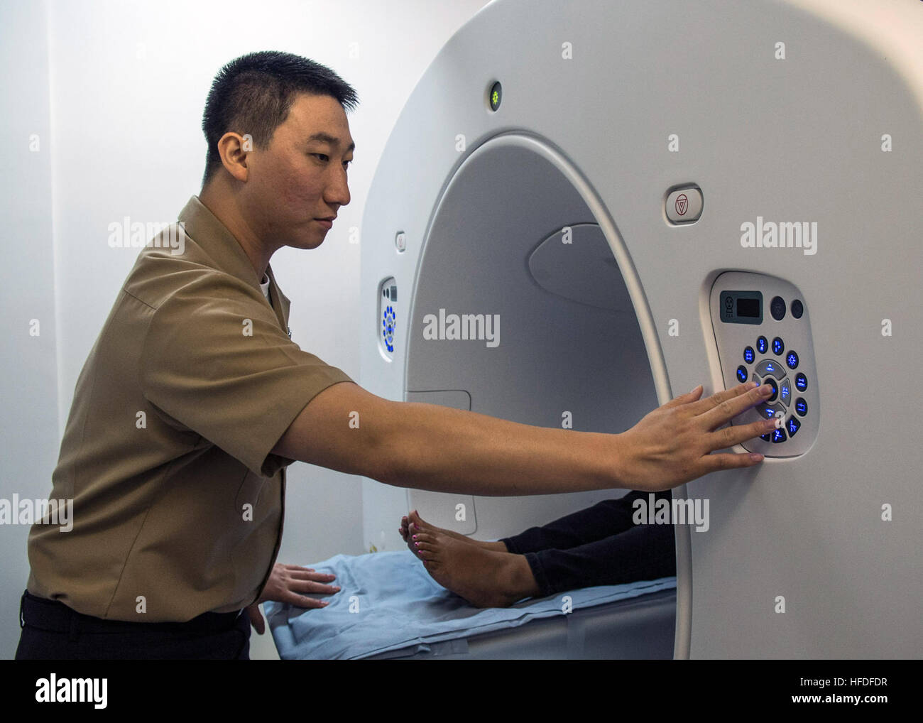 Hospital Corpsman 2nd Class Weiran Wang undergoes equipment ...