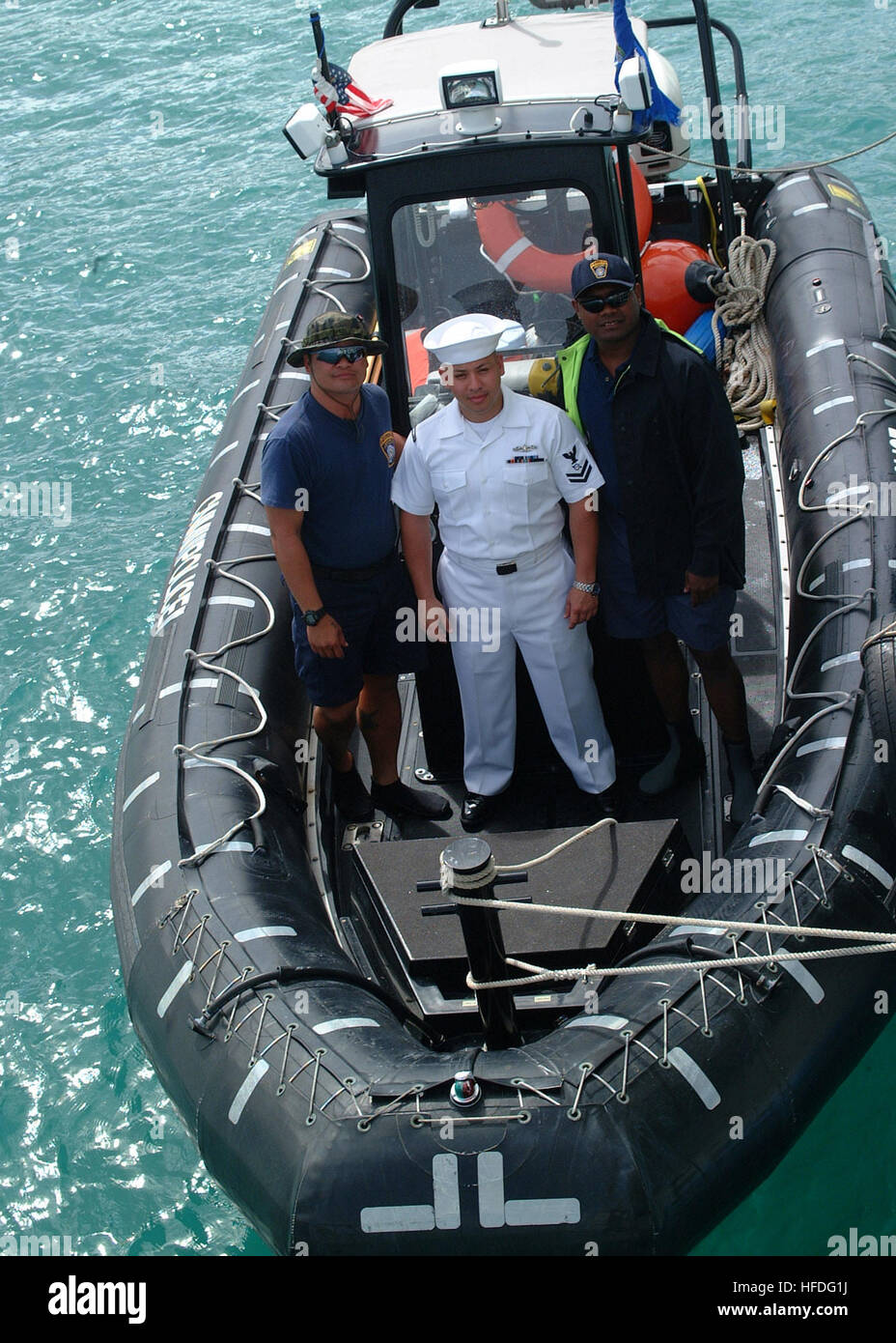 U.S. Navy personnel and CNMI police rescued four people from a capsized ...