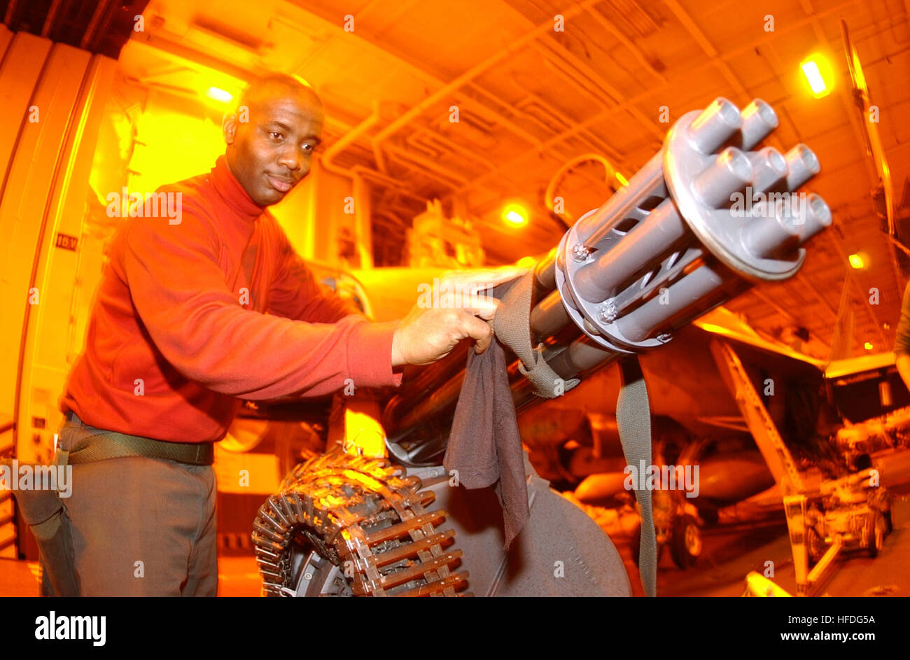 An M61-A1 Vulcan 20mm gun aboard an F/A-18 Hornet is cleaned by ...