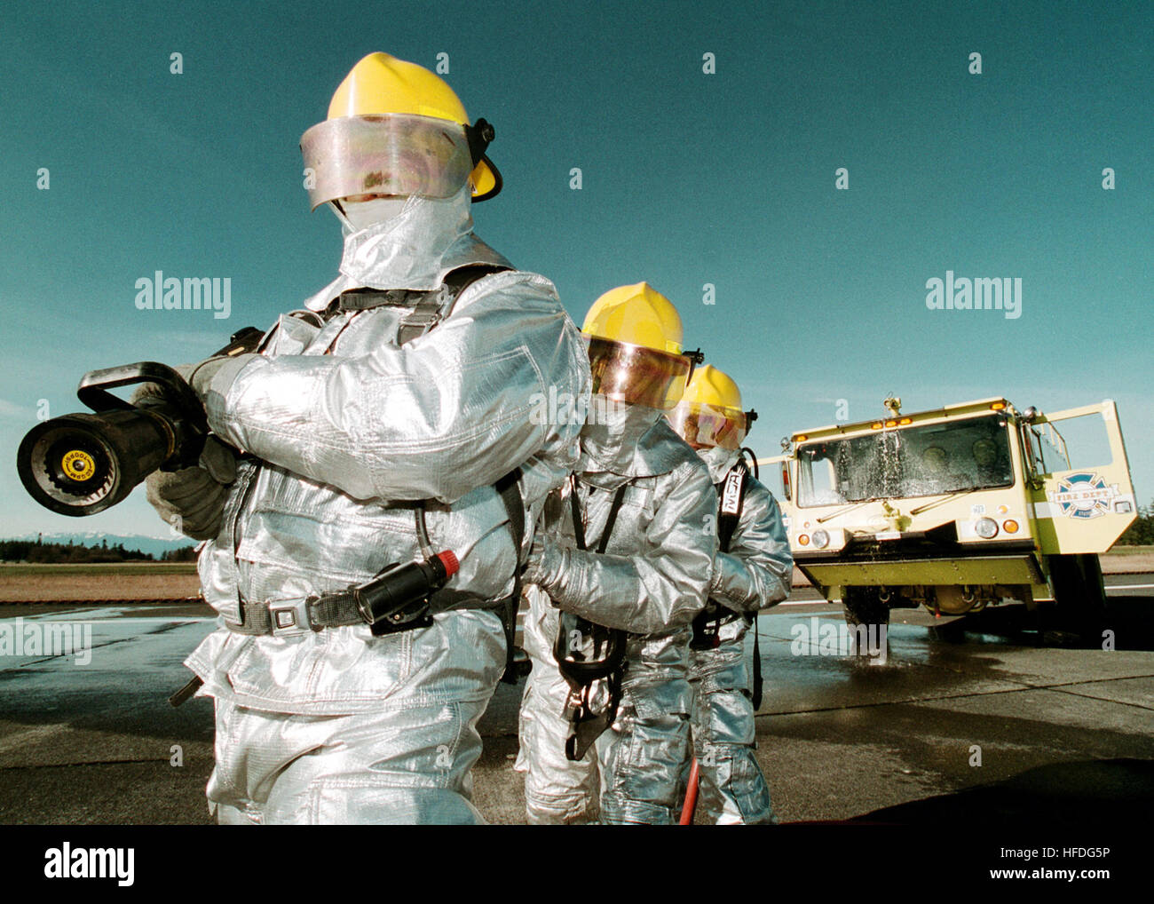 Charged fire hose hi-res stock photography and images - Alamy