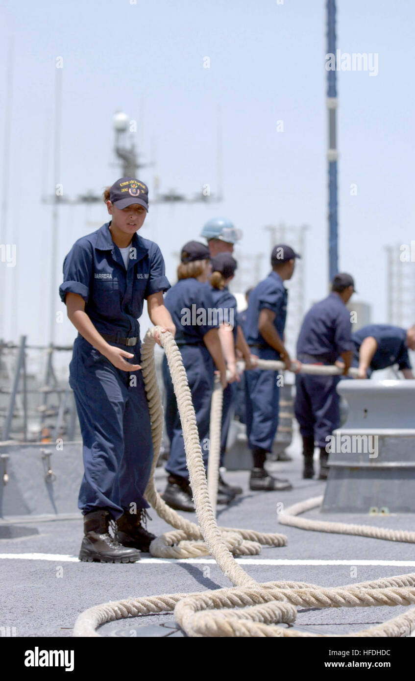 Seamen aboard guided missile destroyer USS Hopper (DDG 70) secure the ...