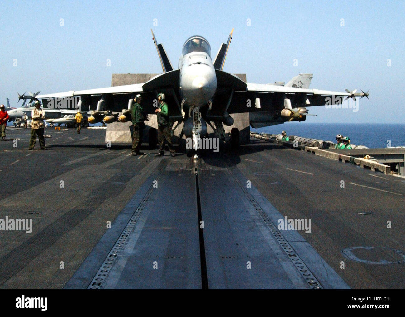 An F/A-18E Super Hornet of Strike Fighter Squadron 115 prepares for ...