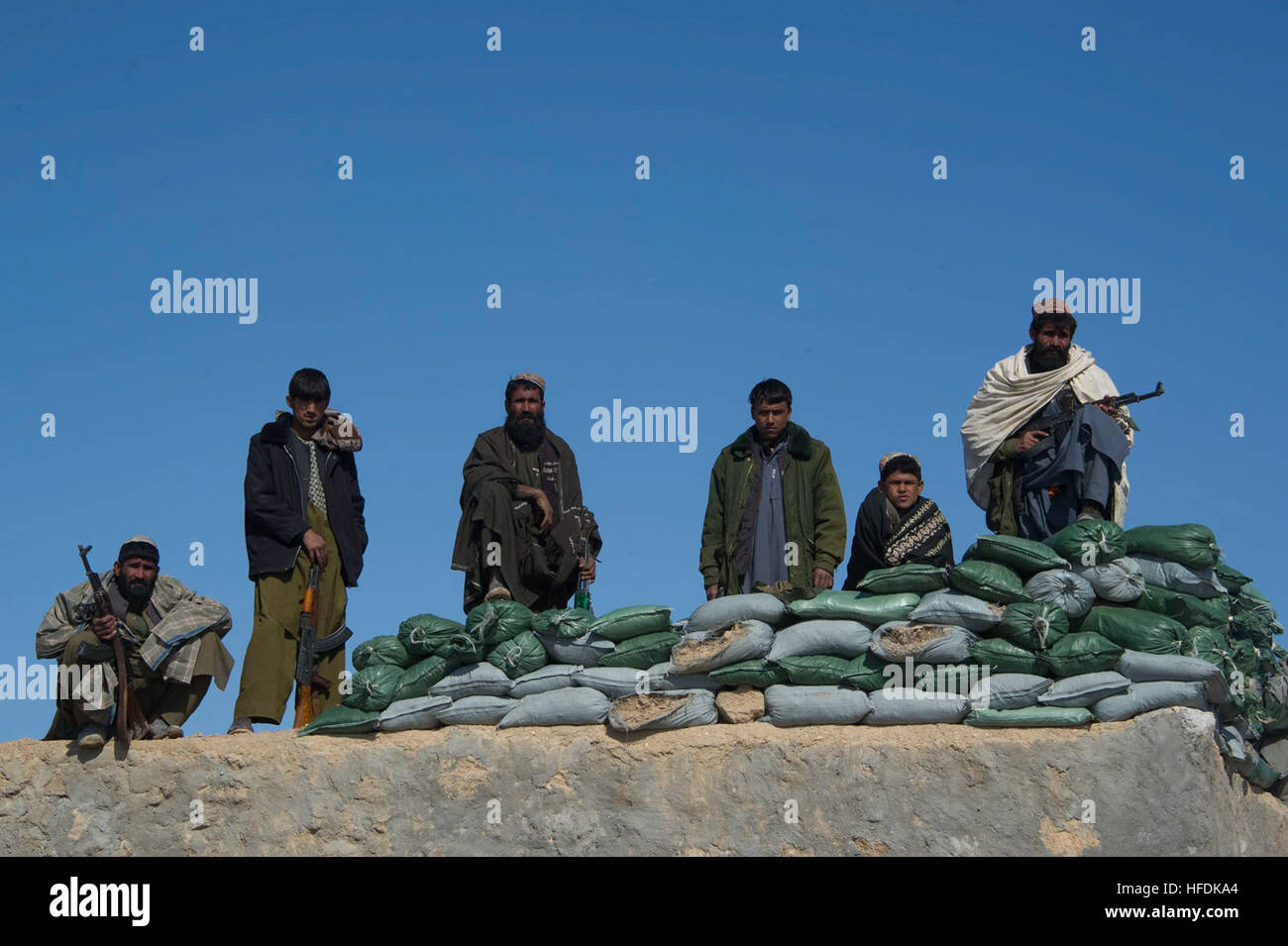Afghan Local Police look on as Afghan National Army Special Forces ...