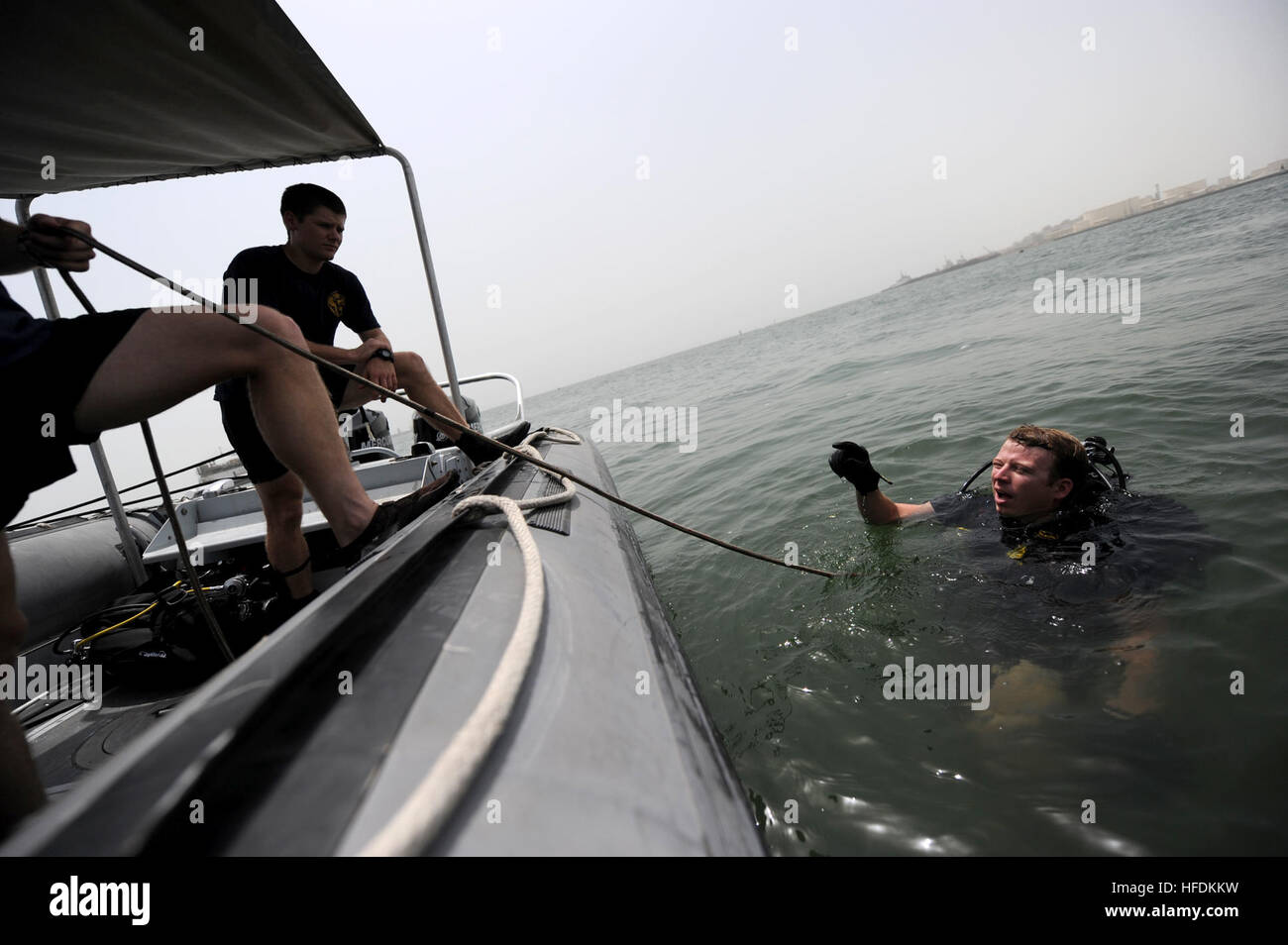 Petty Officer 2nd Class Justin Cavitt, a Navy diver assigned to Mobile ...