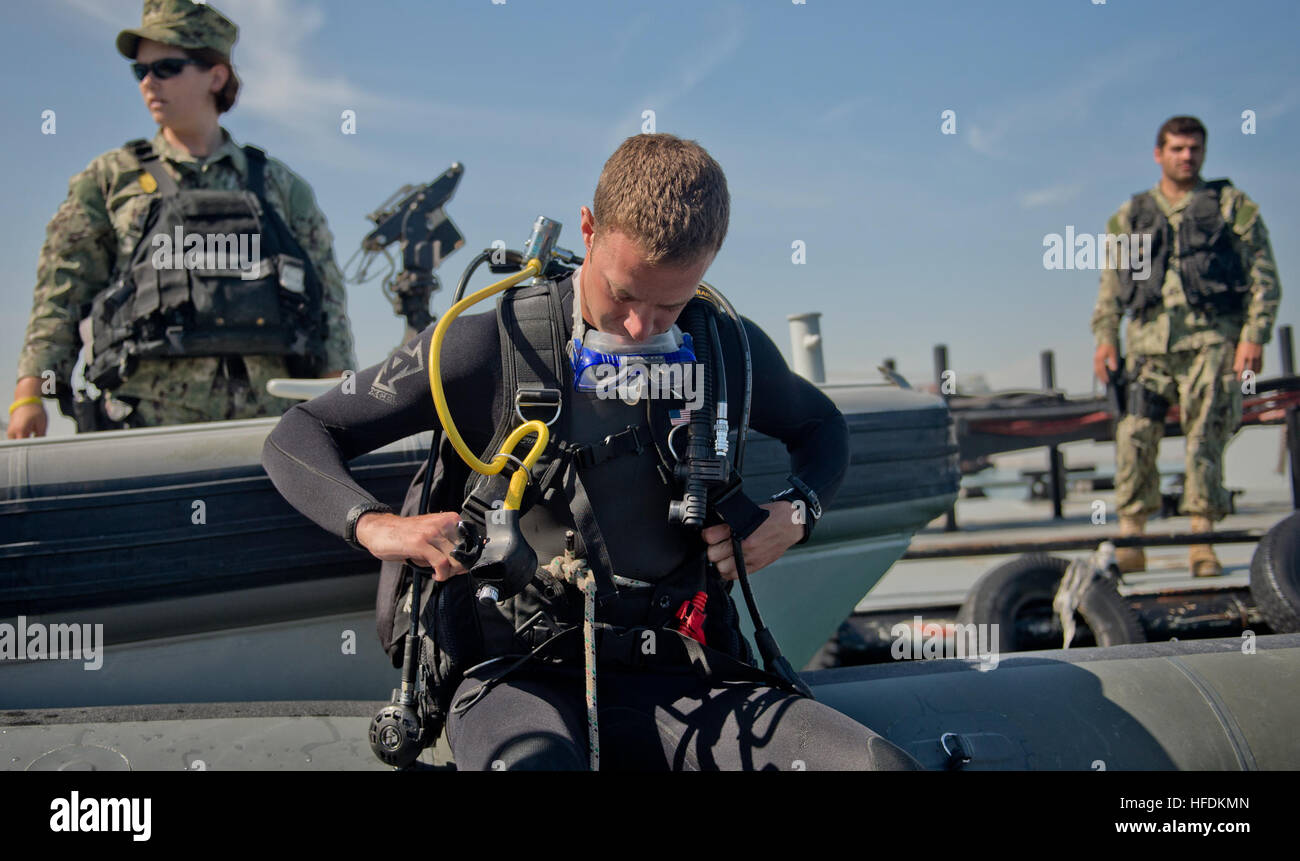 Navy Diver 3rd Class Chad Crawford, assigned to Mobile Diving and ...
