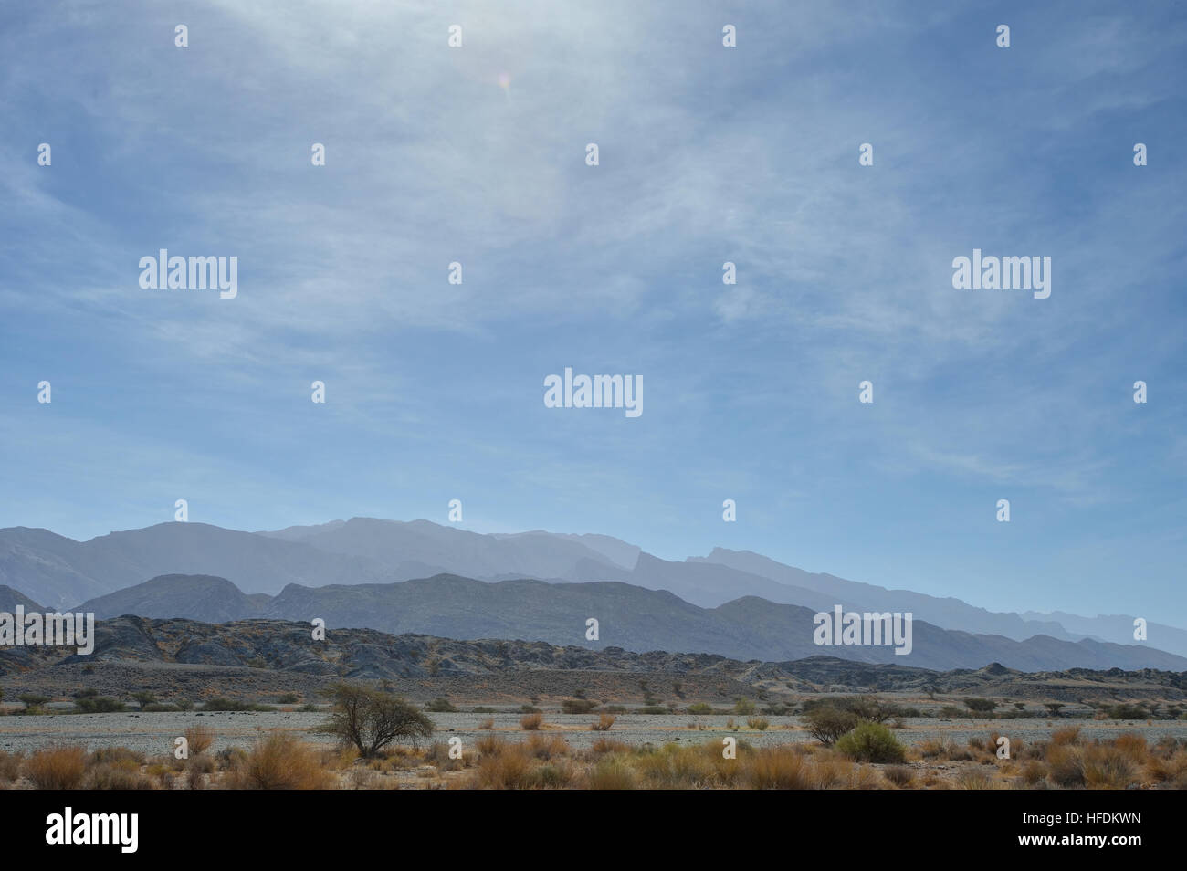 Gravel desert with mountain silhouettes Stock Photo - Alamy