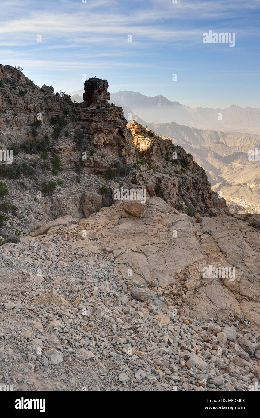 Rocky cliff with blue sky, Jabal Nakhal, Sultanate of Oman Stock Photo ...