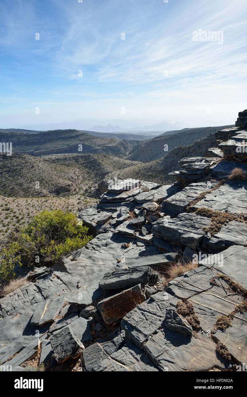 Rocky foreground with mountains, Jabal Nakhal, Sultanate of Oman Stock ...