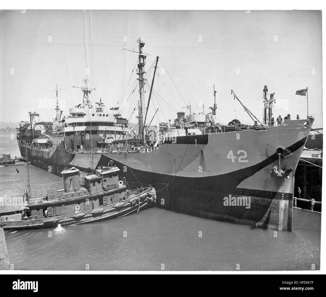USS Monongahela (AO-42) underway conducting refueling operations at sea ...