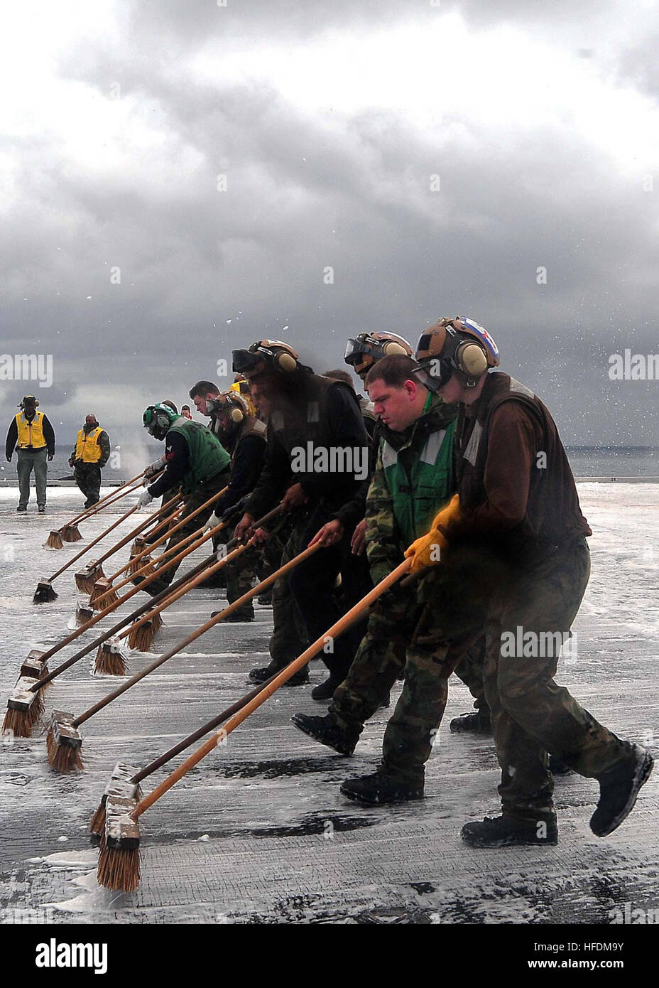 Sailors validate the shipboard firefighting system during an Aqueous ...