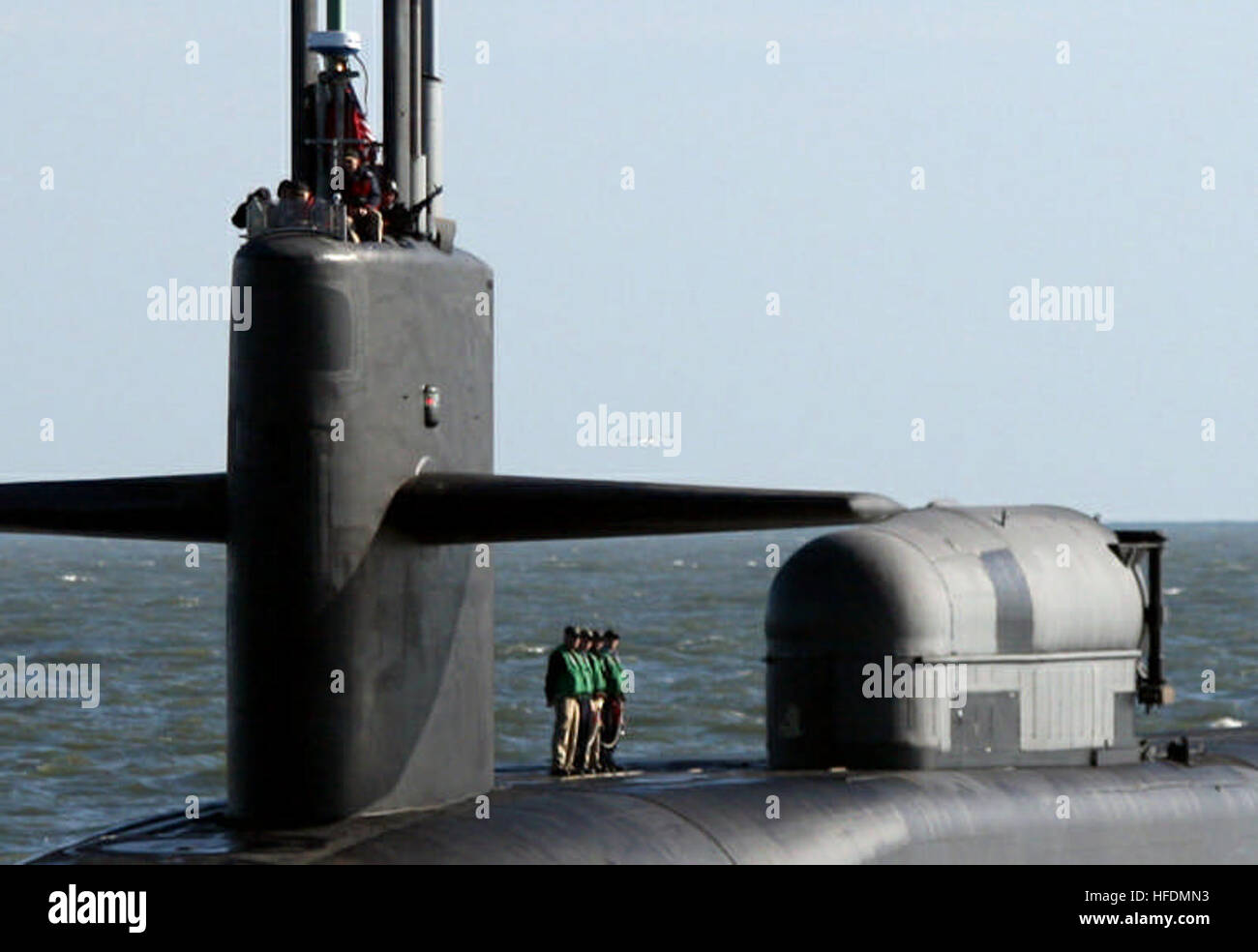 U.S. Sailors man a topside watch onboard the U.S. Navy guided missile ...
