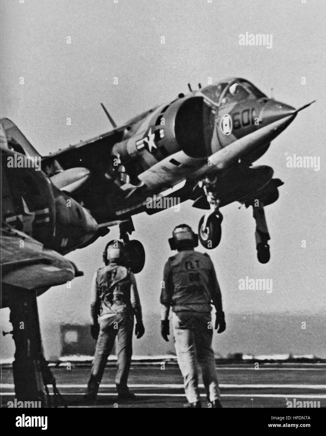 AV-8A of VMA-231 hovering over USS FD Roosevelt (CV-42) in 1976 Stock ...