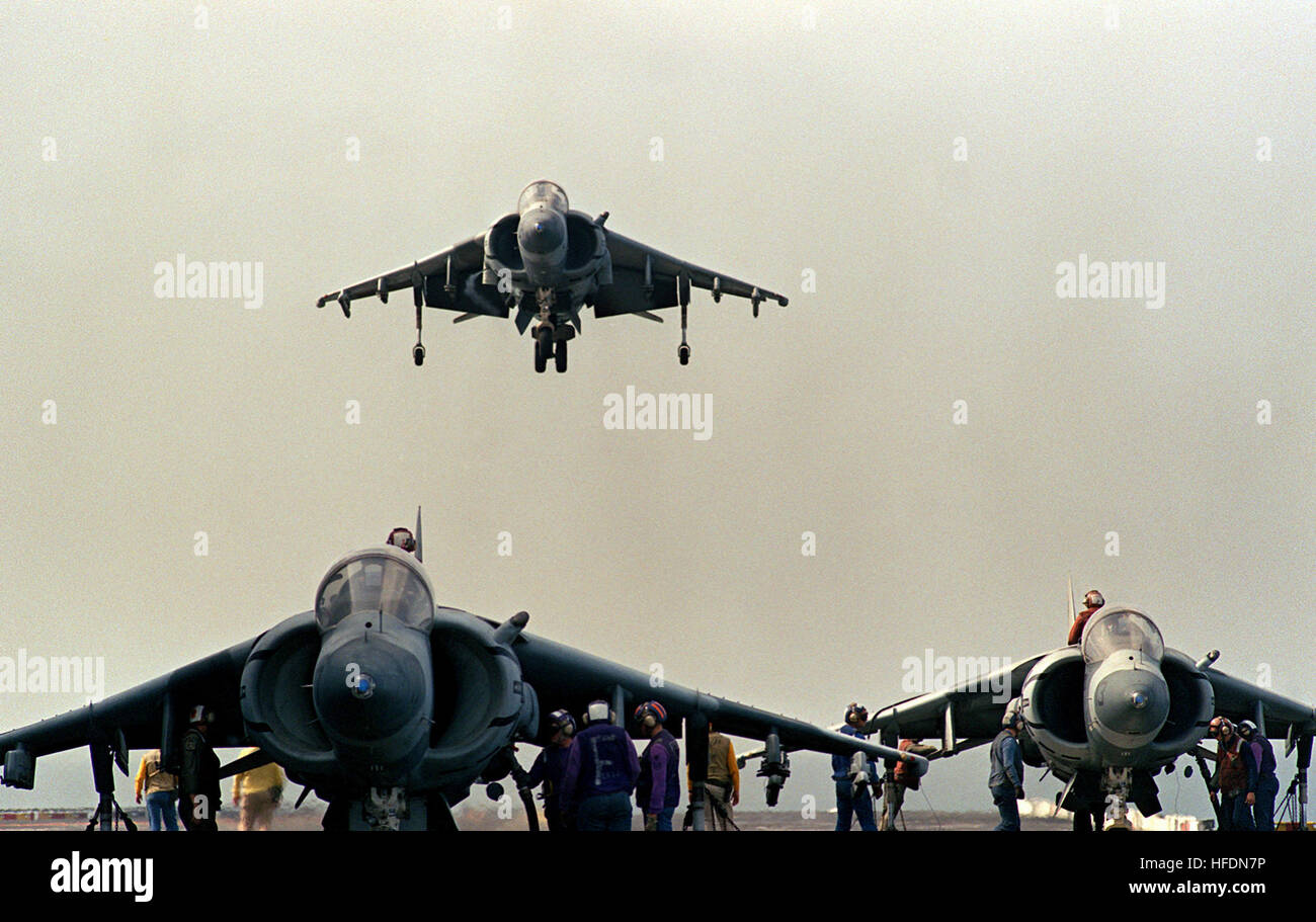 Flight deck crewmen aboard the amphibious assault ship USS NASSAU (LHA ...