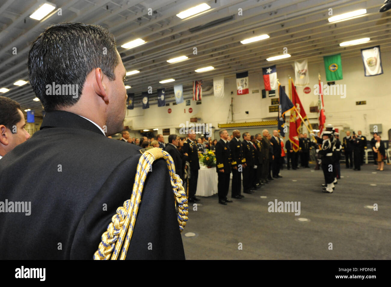 A Peruvian naval officer stands at attention during a reception on the ...