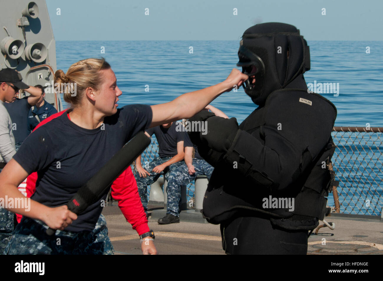 A Sailor conducts OC spray training aboard USS Winston S. Churchill ...