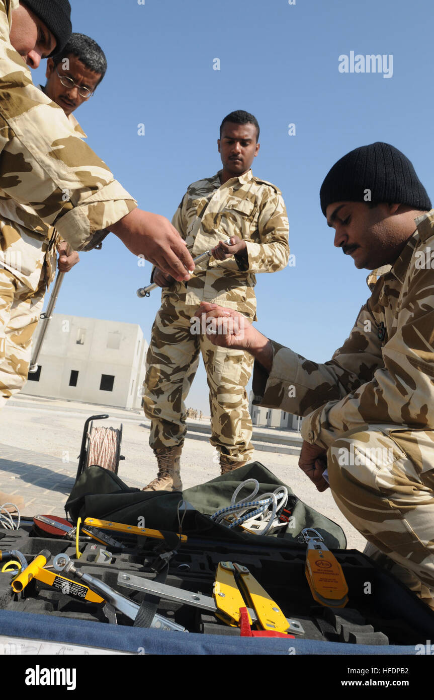 Bahraini Royal Field Engineers search through a hook and line kit for ...