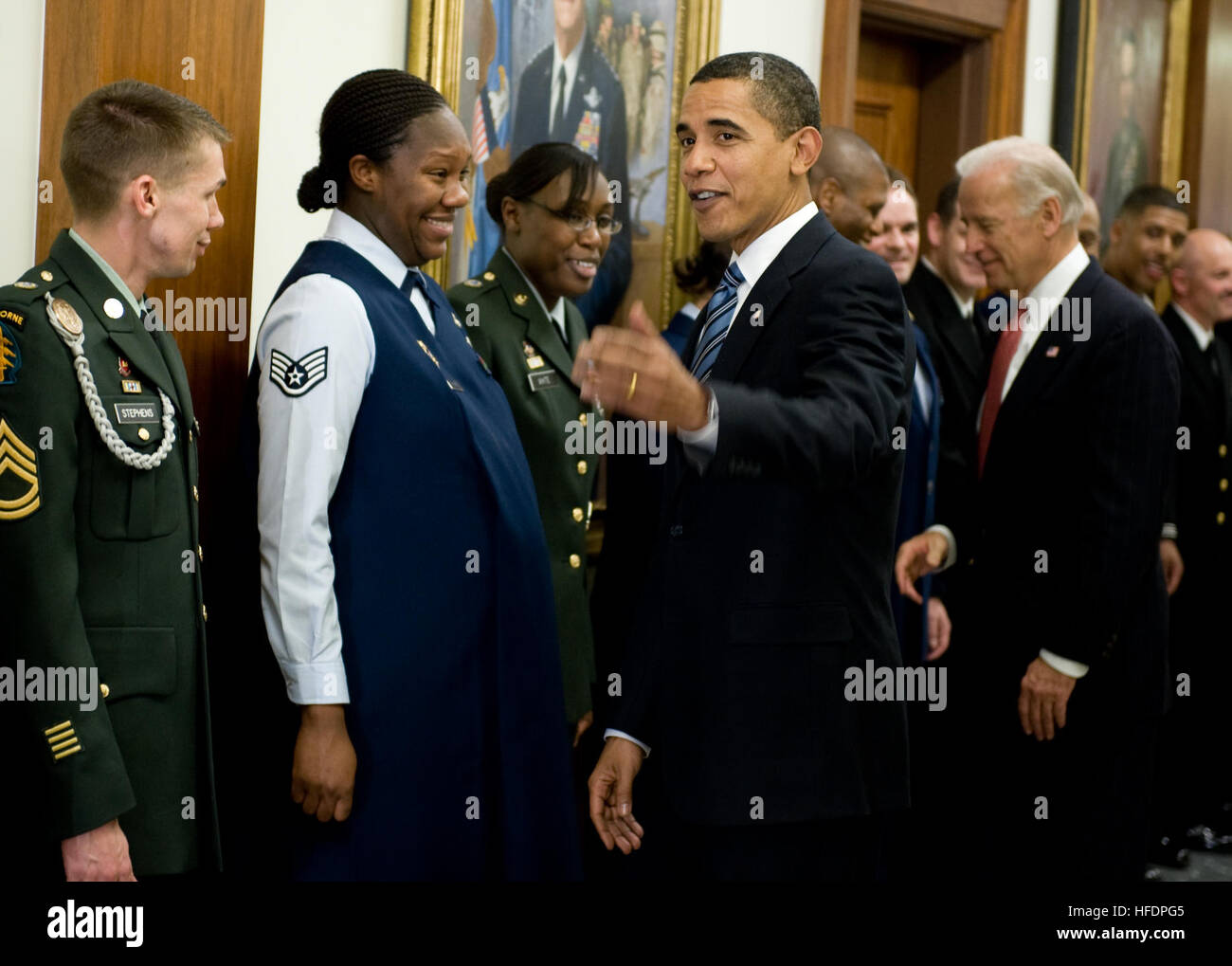 President of the United States Barack Obama speaks with service members ...
