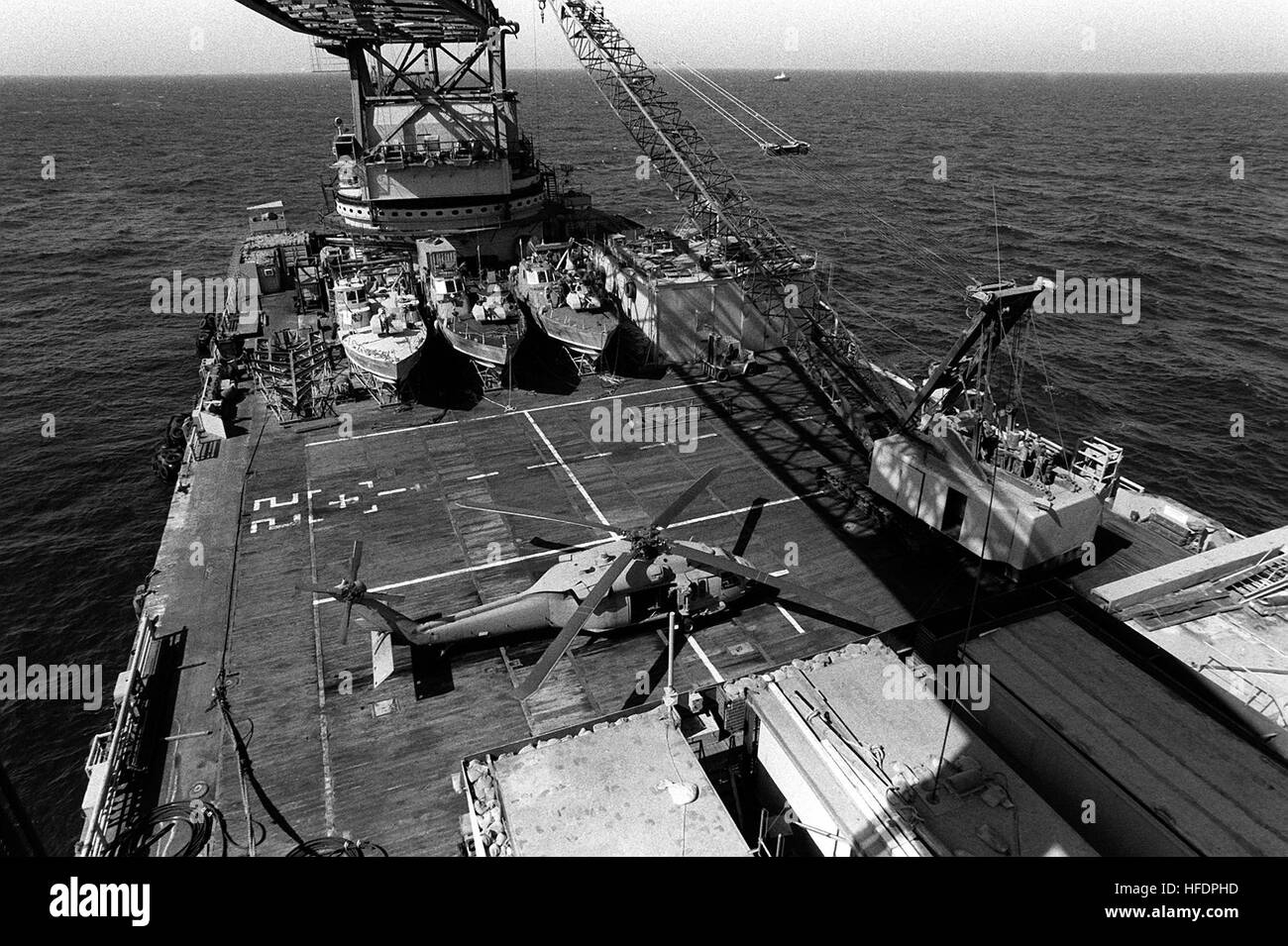 The crane aboard the barge Hercules prepares to lift a PB Mark III ...