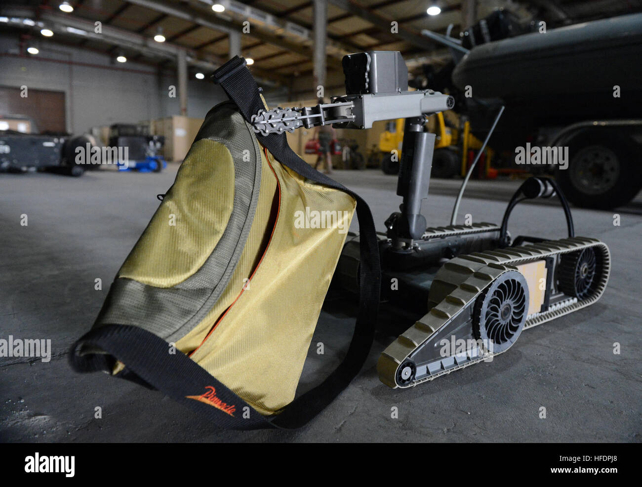 EOD technicians with CTF-56 employ a bomb disposal robot during a base ...