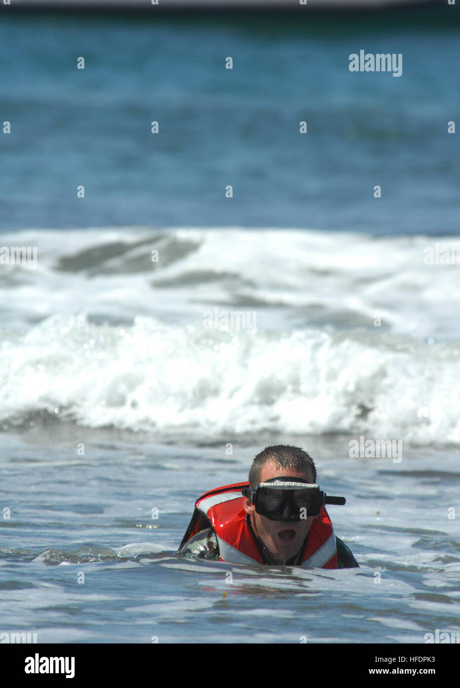 Seaman Apprentice Brian Musgrave comes up for air while swimming back ...