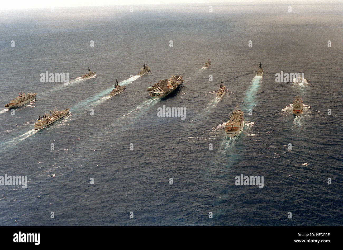 An aerial starboard quarter view of Battle Group Charlie underway in ...
