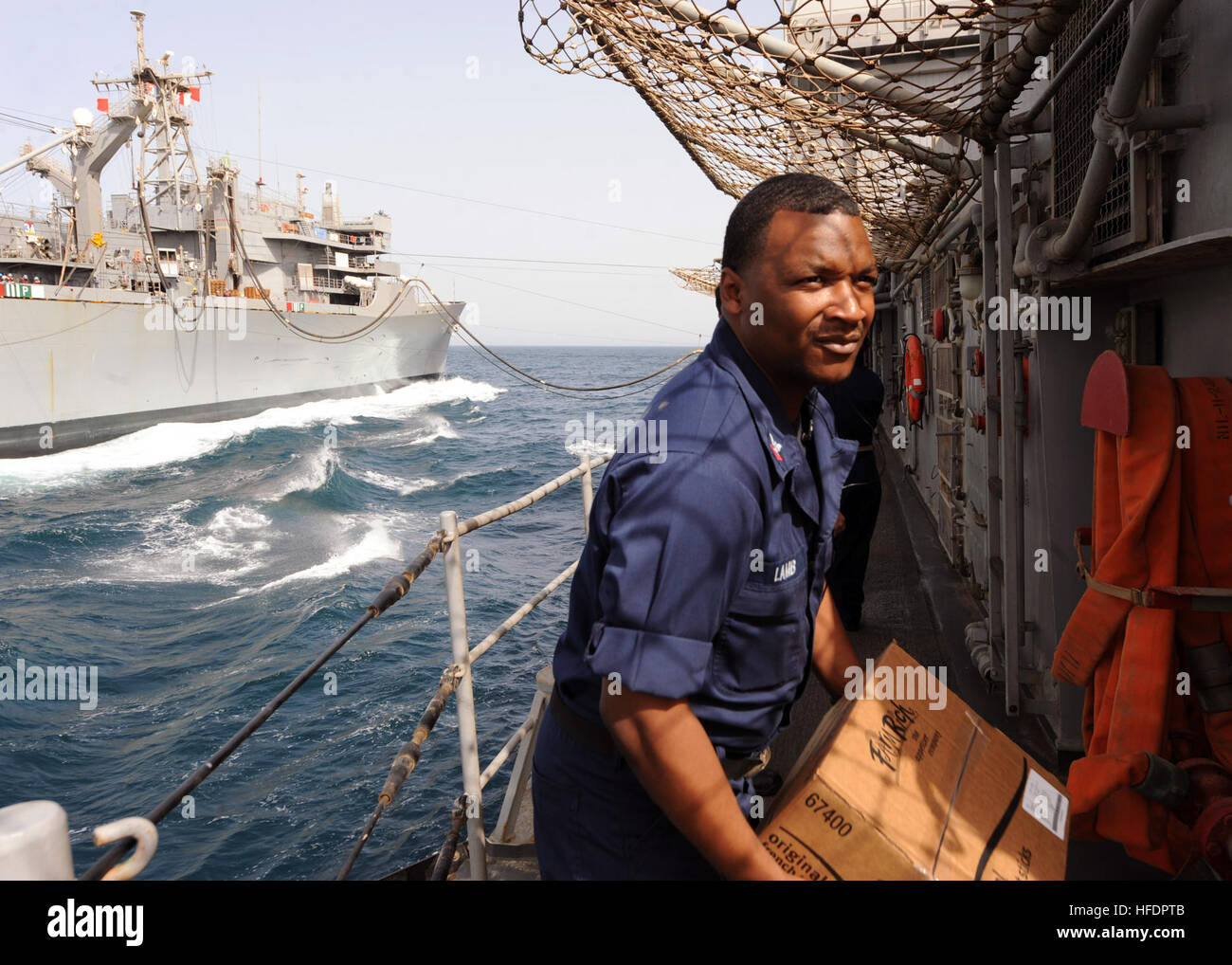Quartermaster 2nd Class Arden M. Lamb participates in an all-hands ...