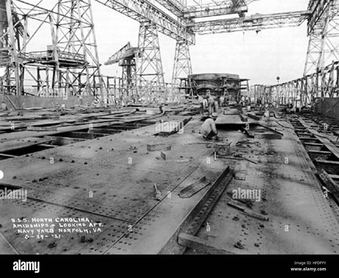 Port side midships view of the partially constructed BB-52 PCU North ...