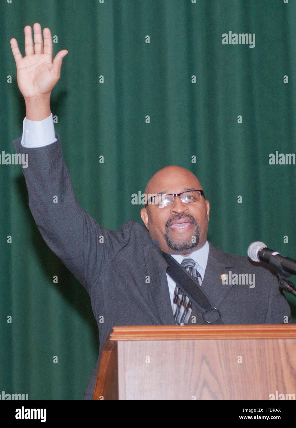 Michael Miner, a retired U.S. soldier, waves to the audience while ...
