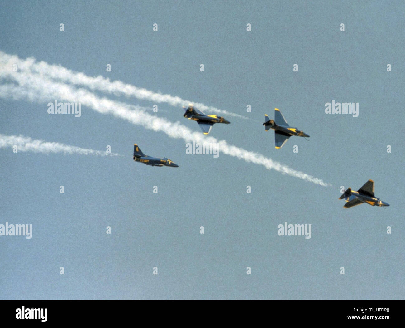 Blue Angels A-4F aircraft perform a tuck-under break maneuver at ...