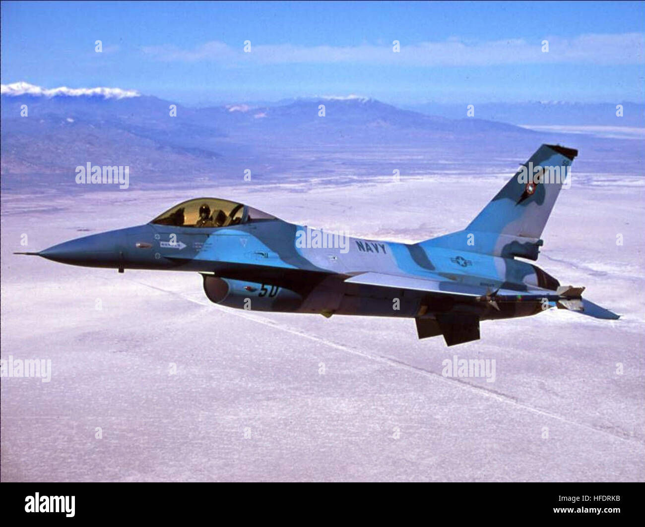 Blue F-16A NSAWC in flight over Nevada Stock Photo - Alamy