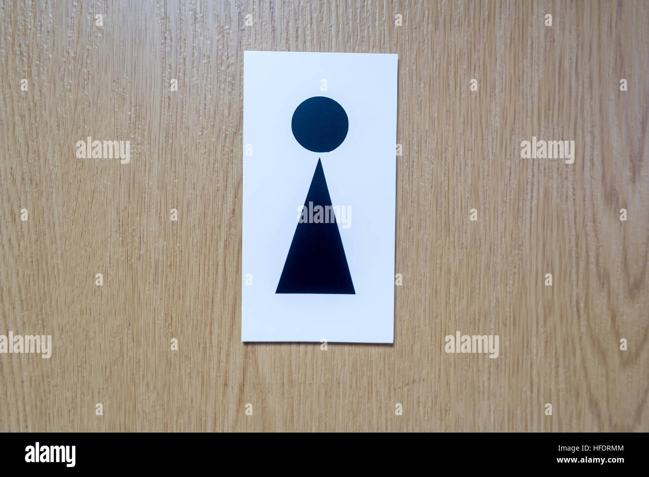 White restroom symbol on wooden hi-res stock photography and images - Alamy