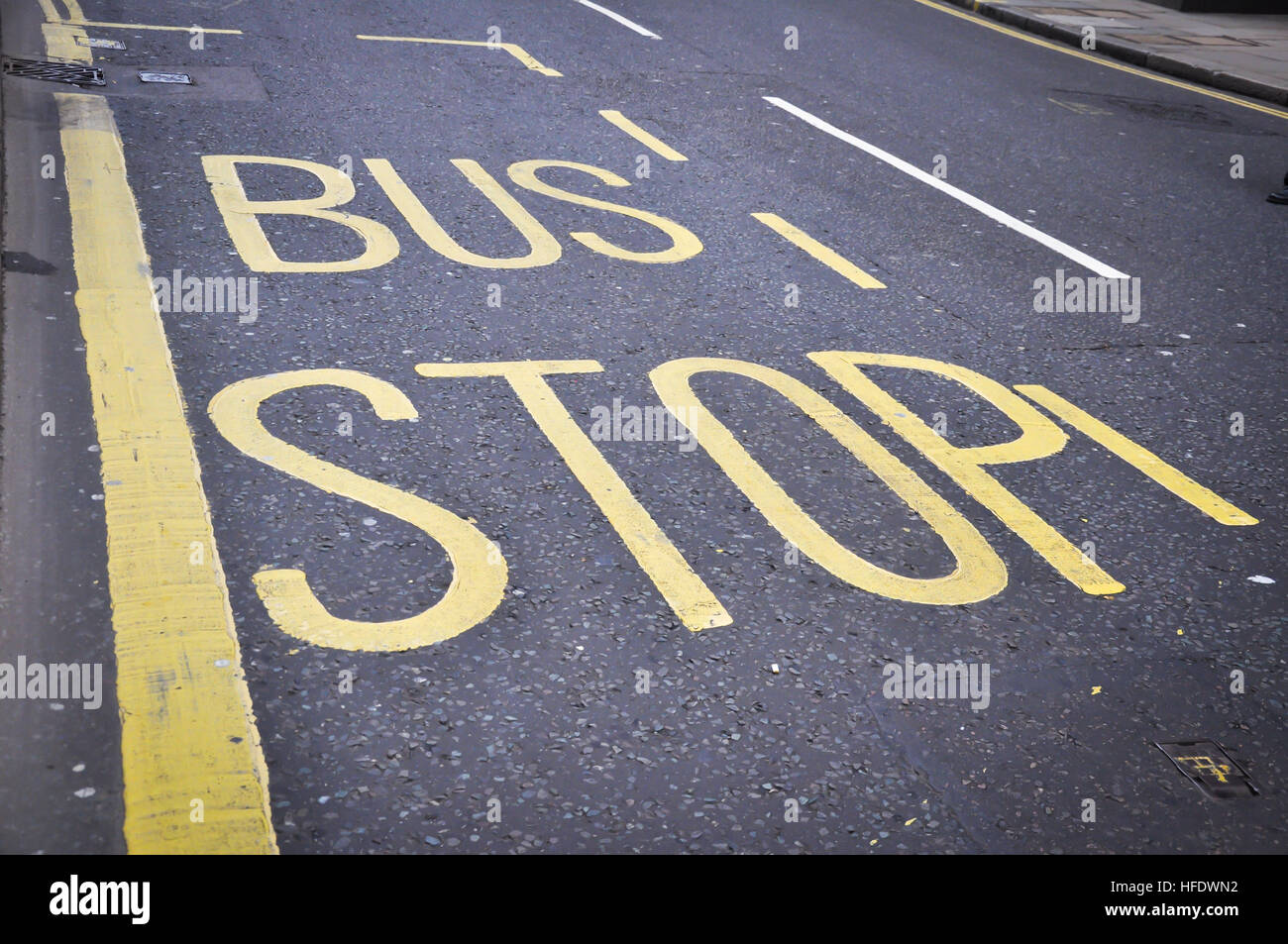 Bus stop street asphalt sign Stock Photo - Alamy