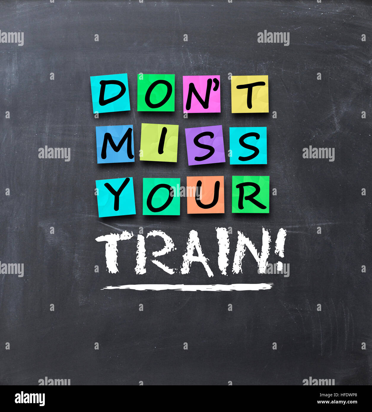 Don’t miss your train text on colorful post-it notes stuck on ...