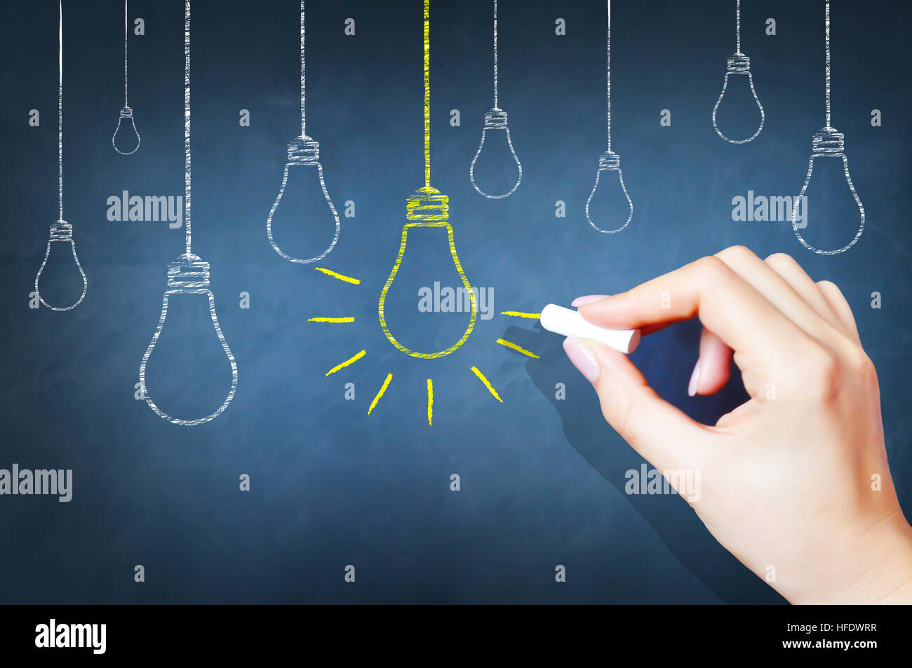Bright idea on blackboard concept Stock Photo - Alamy