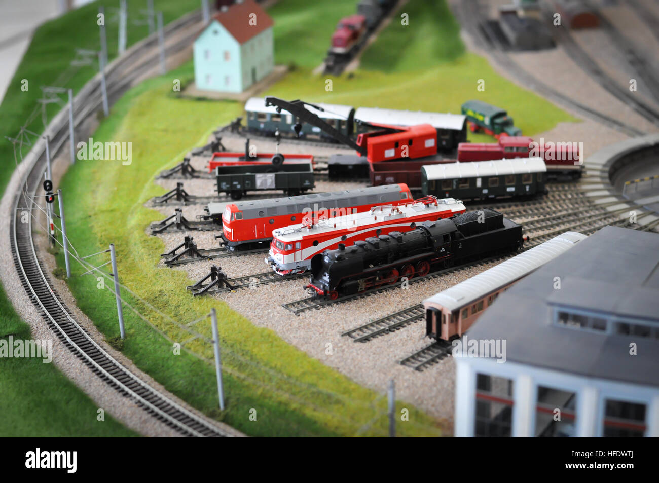 Railroad maquette with colorful trains Stock Photo - Alamy