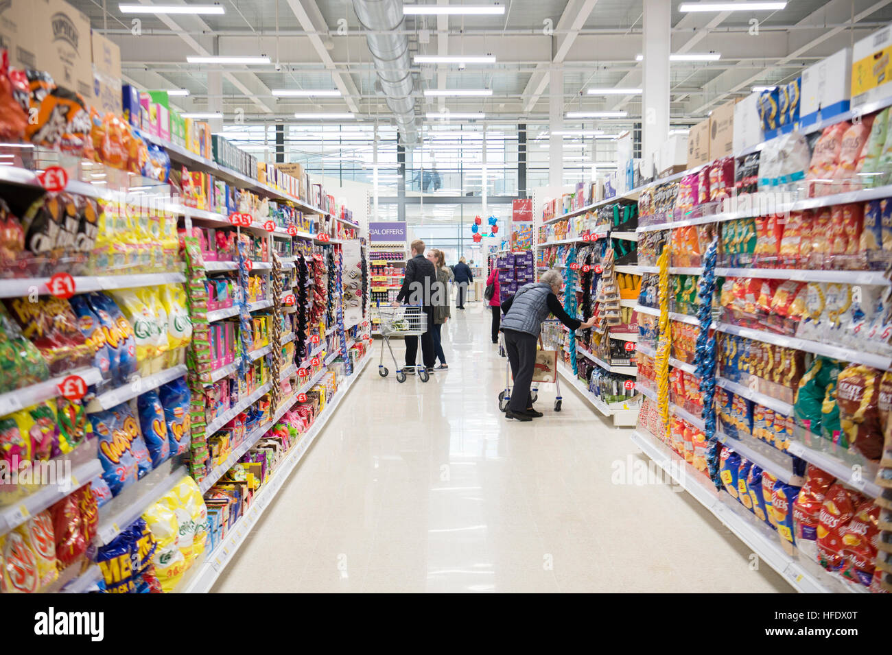 People shopping in the Tesco supermarket superstore, Aberystwyth Wales ...