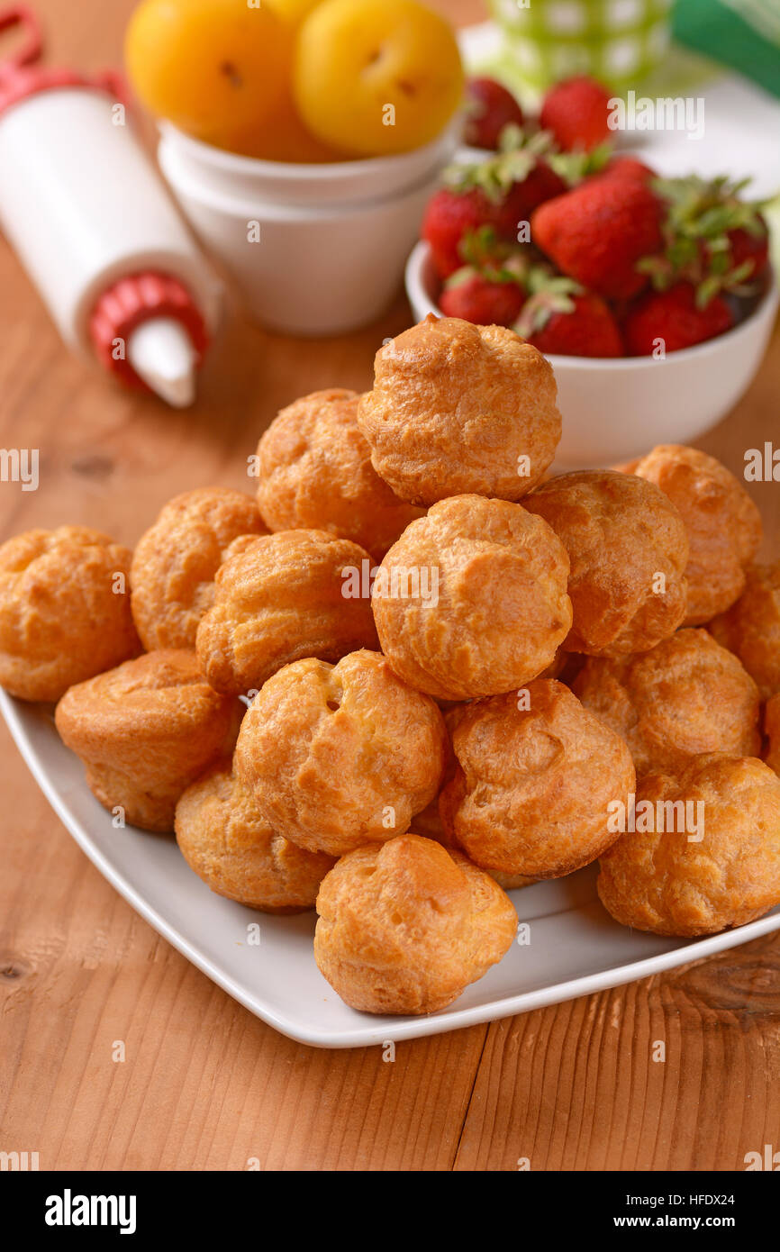 puffs can be filled on the wooden table Stock Photo - Alamy