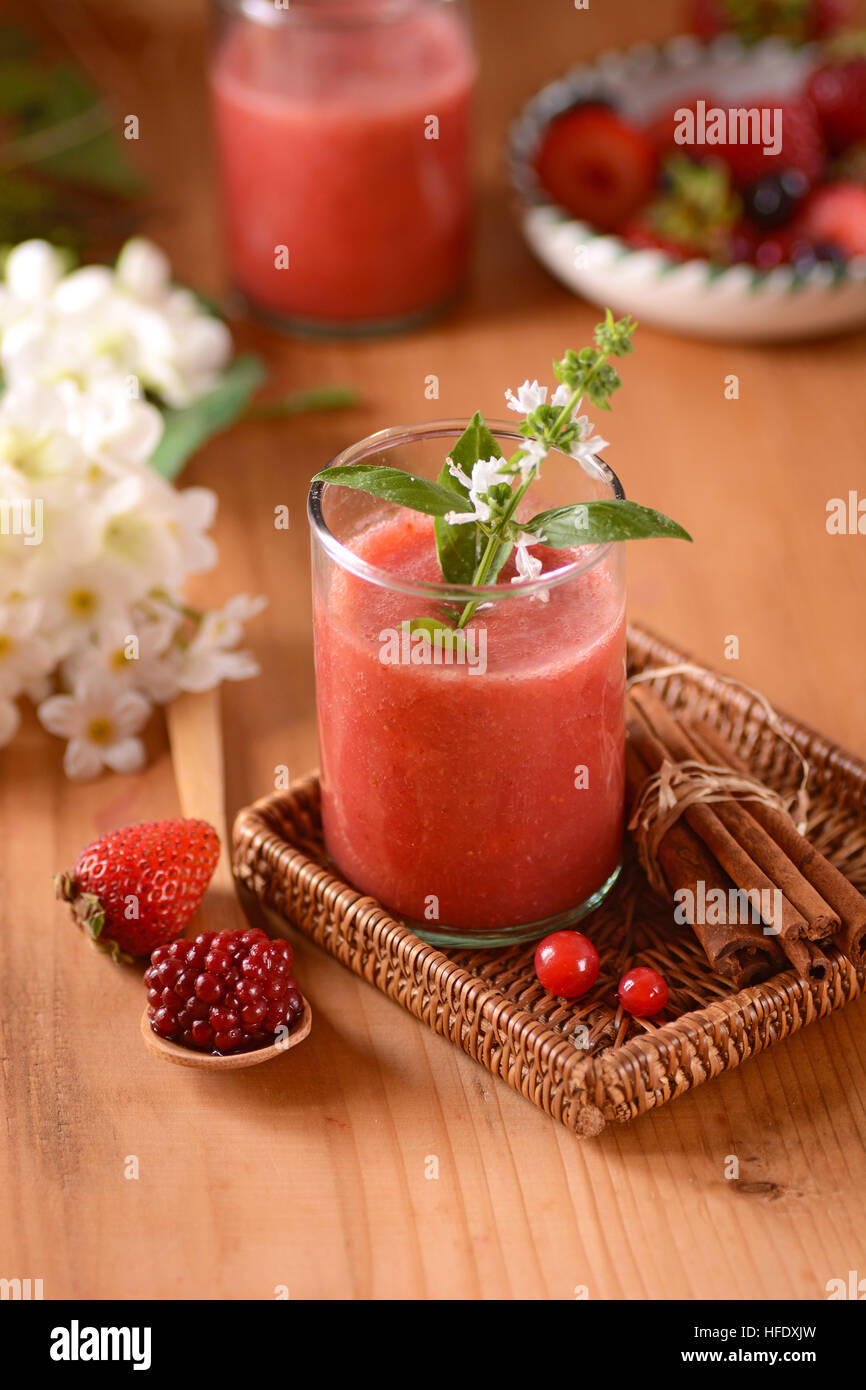 fruit smoothie with strawberries and berries with ingredients around ...