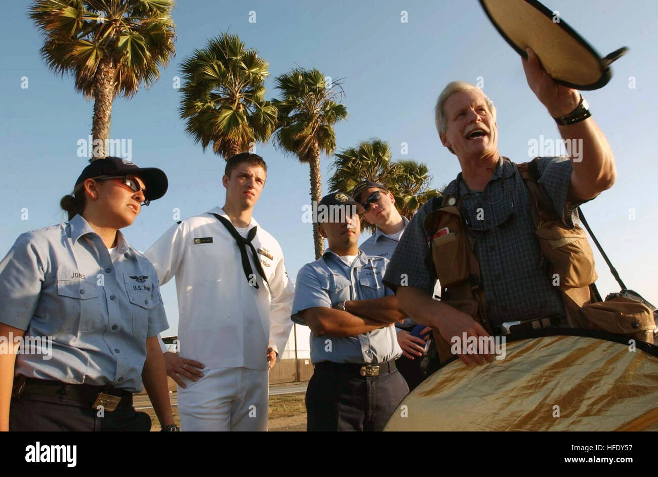 Photographers from the Navy receive instruction from industry ...