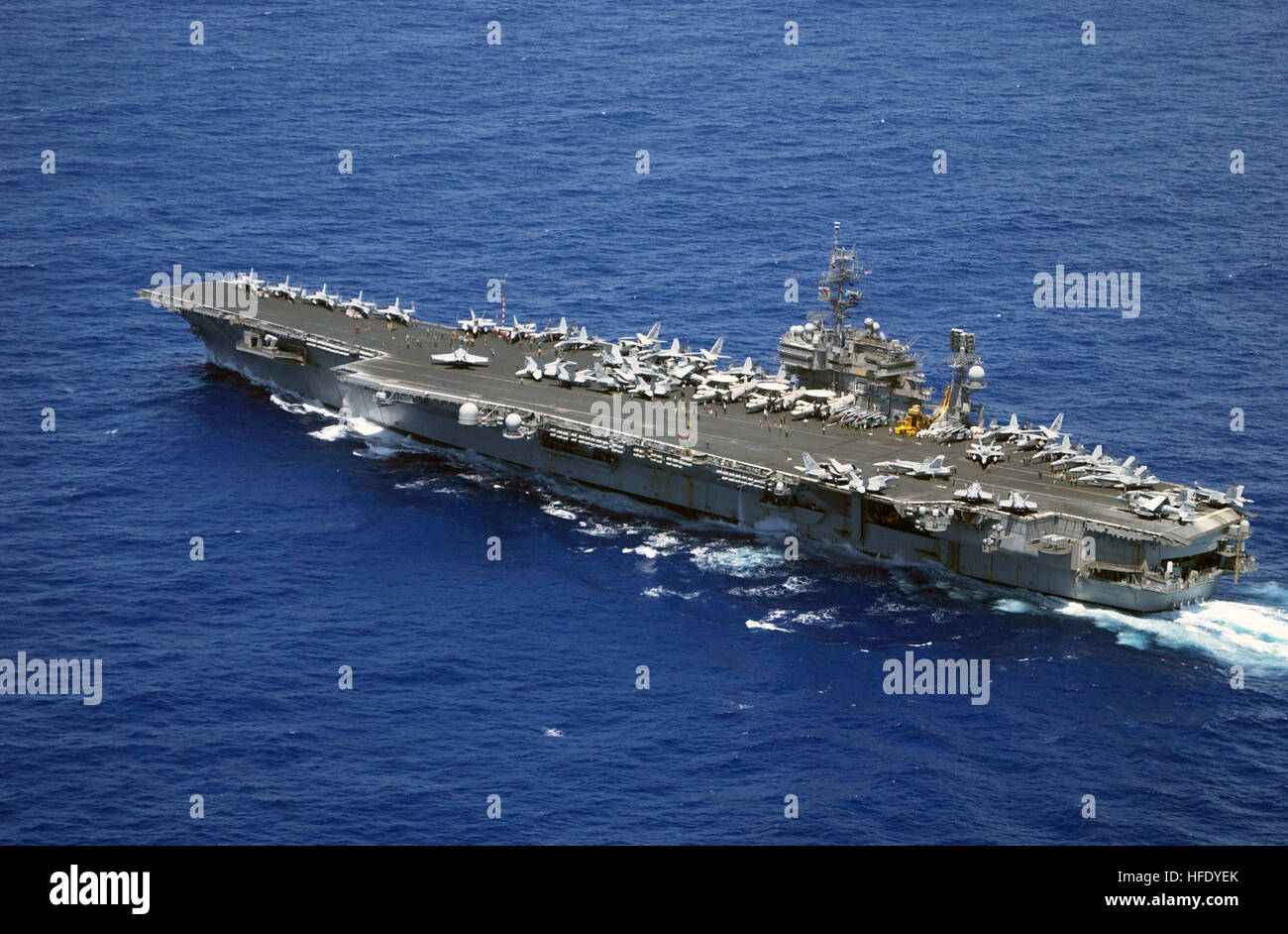 USS Kitty Hawk conducts flight operations in the Philippine Sea ...