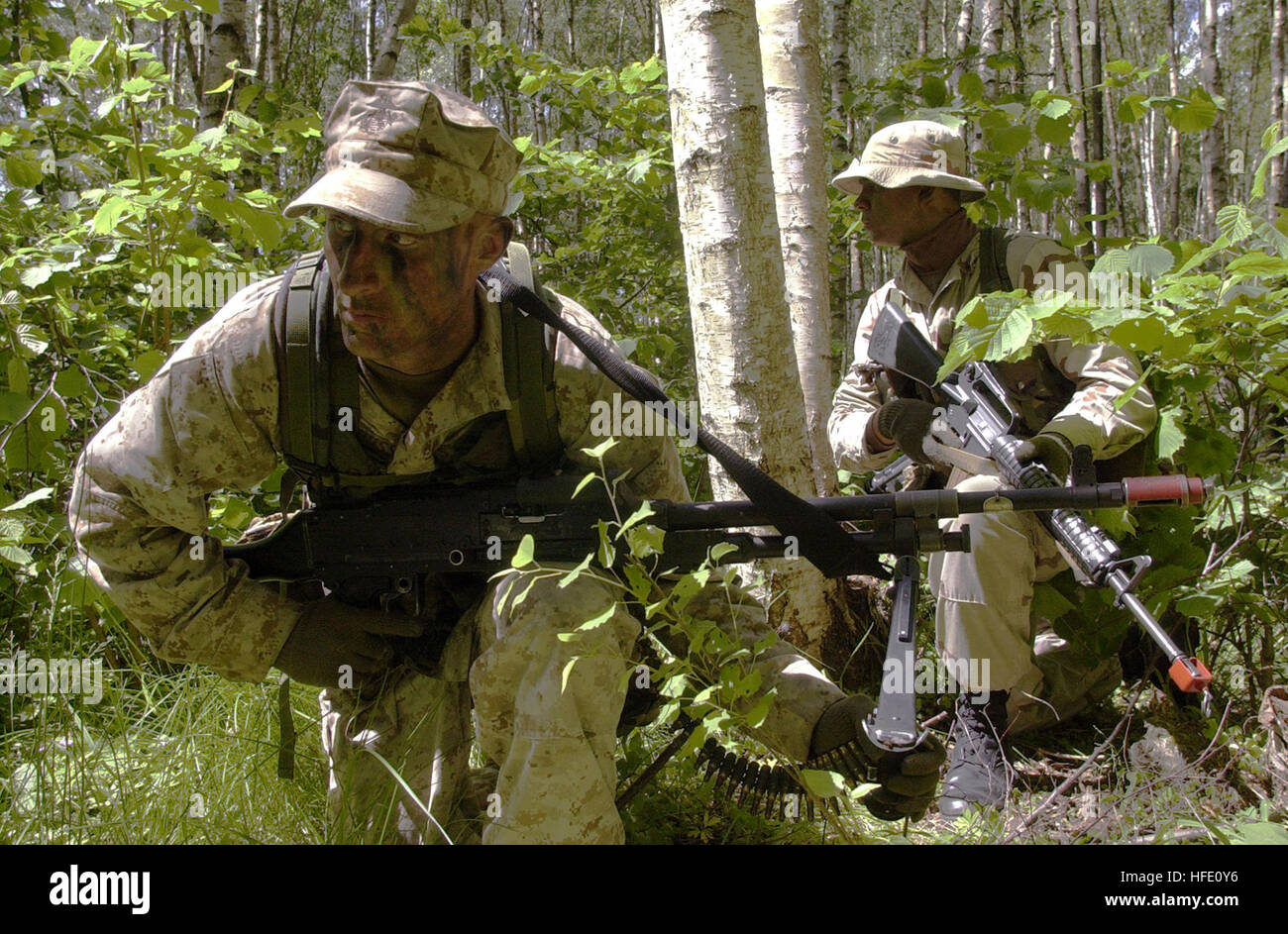 040616-N-1823S-494 Ustka, Poland (Jun. 16, 2004) - U.S. Marines patrol ...
