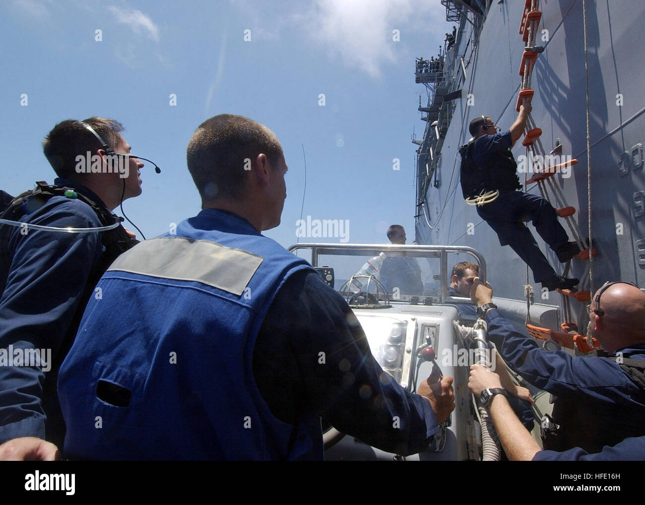 A Sailor from the VBSS team climbs a pilot's ladder during a Maritime ...