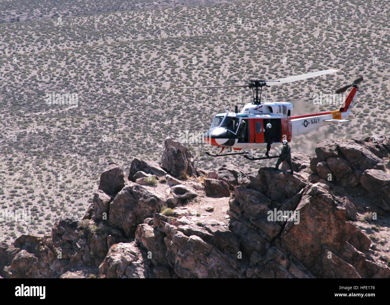 A U.S. Navy Search and Rescue (SAR) team member and Hospital Corpsman ...