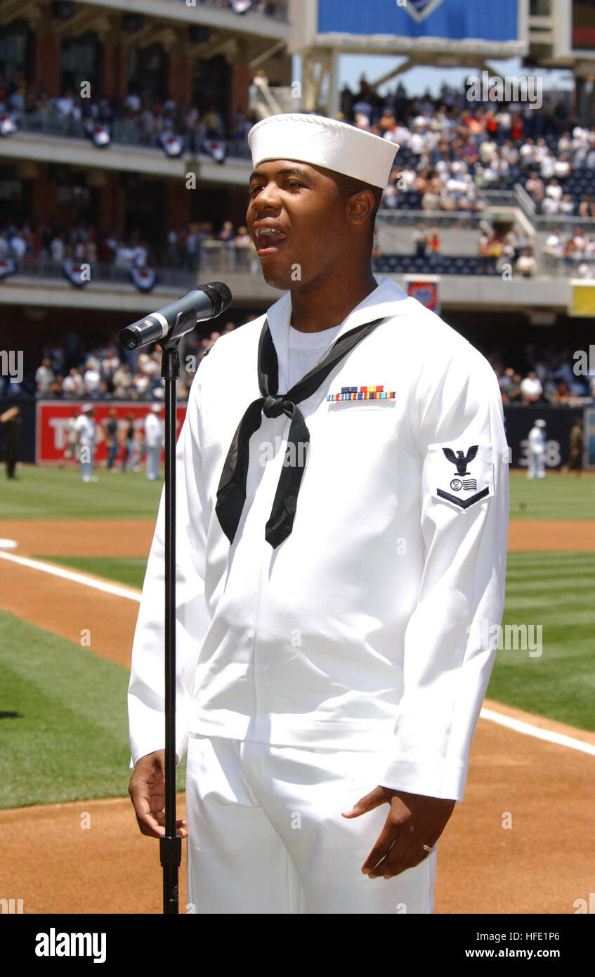 USS Nimitz crew member performs the National Anthem at Petco Park, San ...