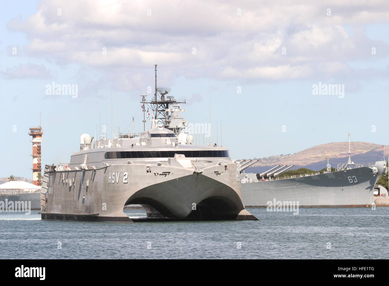 High Speed Vehicle Two (HSV-2) Swift maneuvers near Ford Island by USS ...
